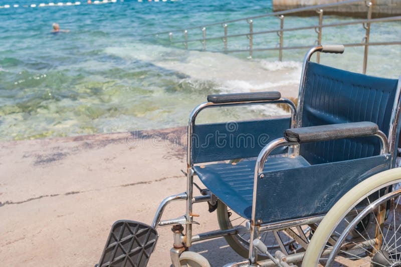 Accessible Beach with Wheelchair Stock Image - Image of water ...