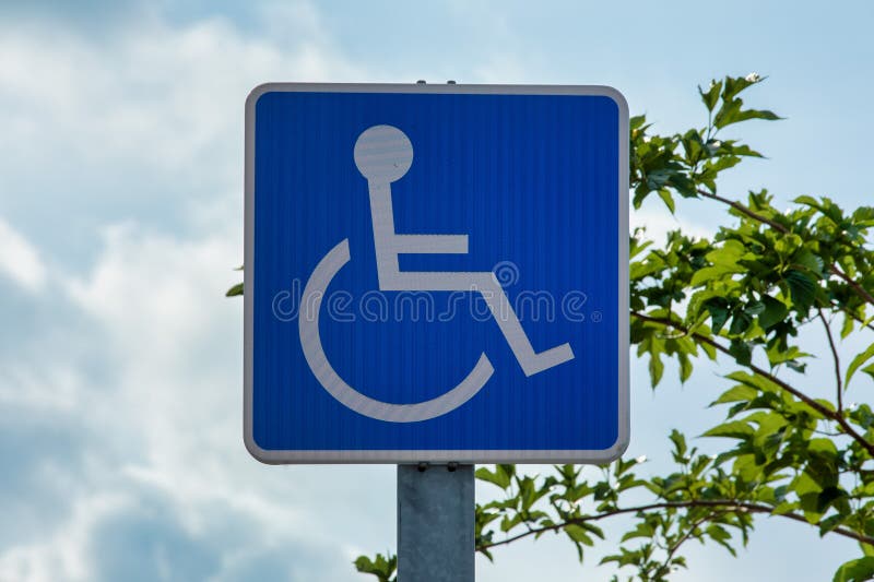 Accessible Parking: Handicap Parking Sign in Parking Lot Stock Image ...