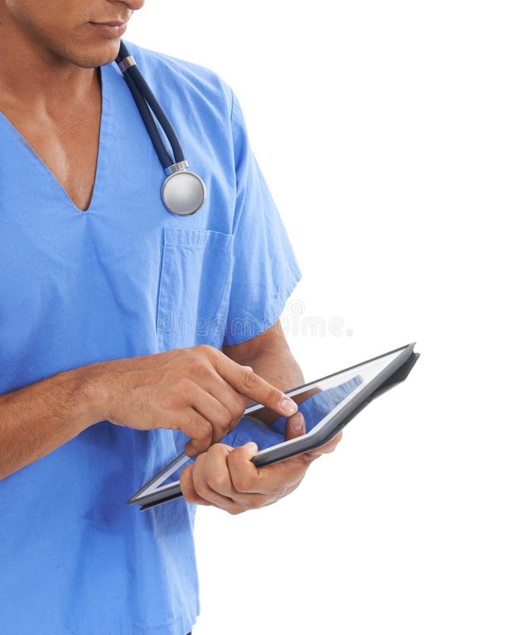 Accessing His Patients Records. a Young Doctor Using an Ipad Against a ...