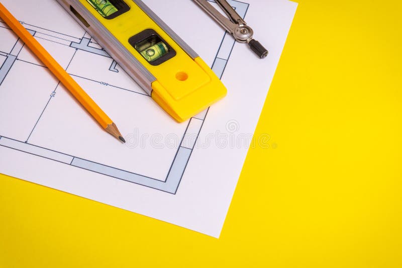 Accessories and Drawing Tools Lie on Building Project or on the Yellow ...