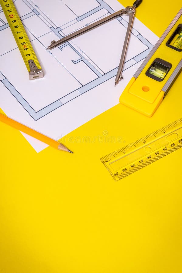 Accessories and Drawing Tools Lie on Building Project or on the Yellow ...