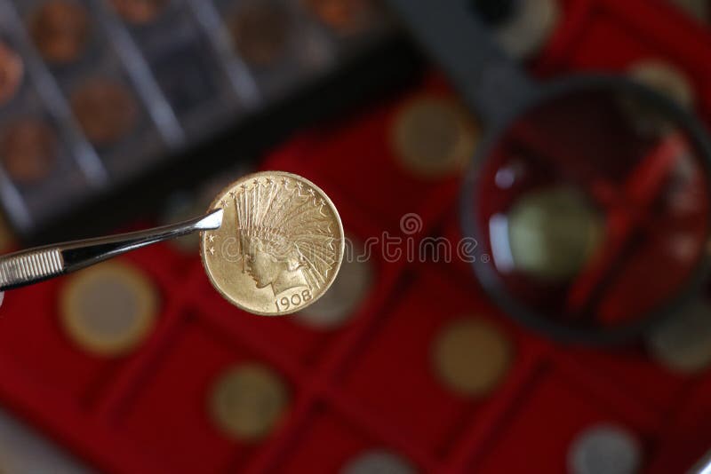 Numismatic at Work Shows Some Gold Coins. Stock Photo - Image of ...