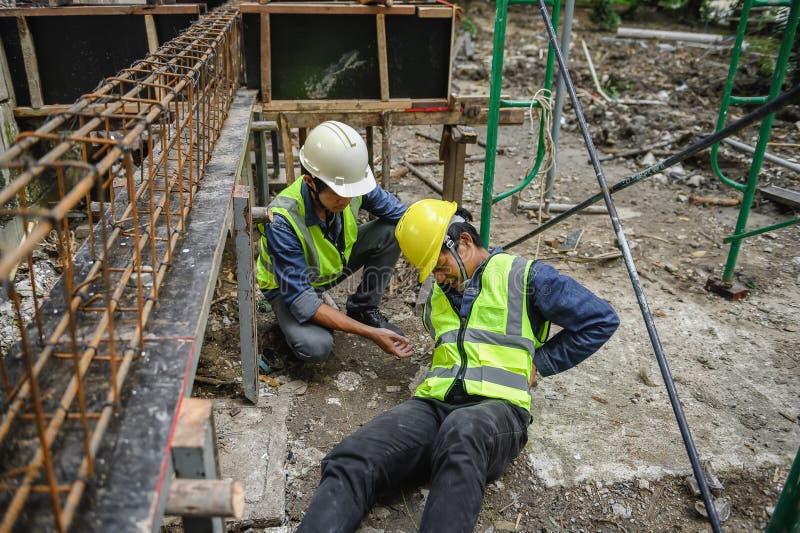 Accident of Builder Worker in Work at Construction Site. Accident Falls ...