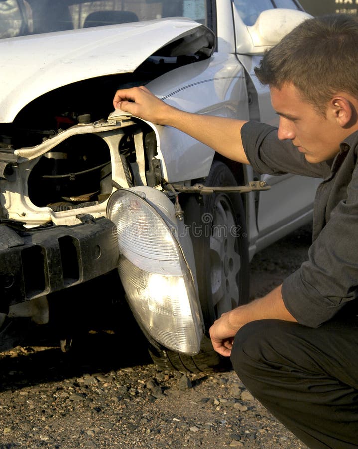 Driver Inspecting Damage after Traffic Accident Stock Photo - Image of ...