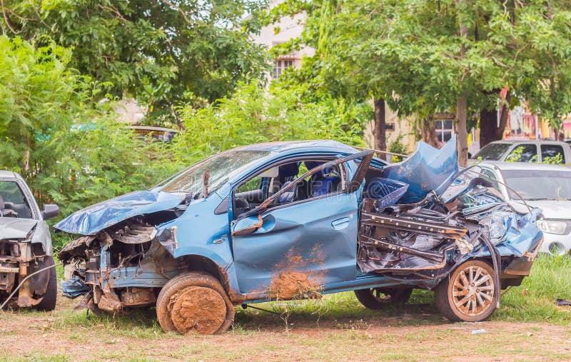 Rollover Compact Car Crash. White Crashed Car in the Mountain Road ...