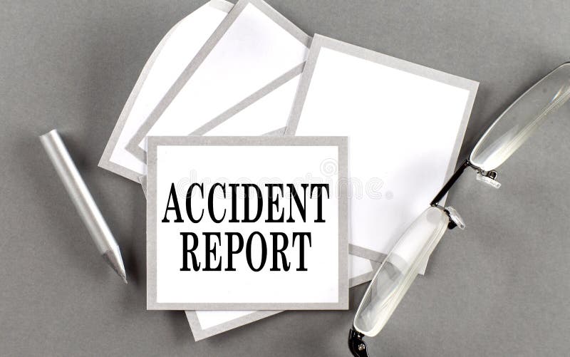 ACCIDENT REPORT Text Written on a Sticky with Pencil and Glasses Stock ...