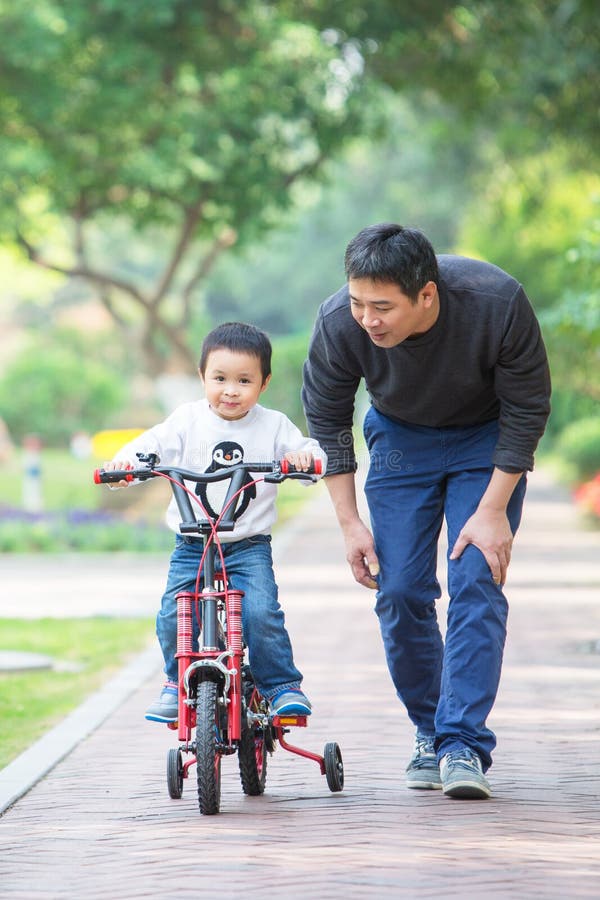 Accompany stock image. Image of families, happy, cycle - 87904141