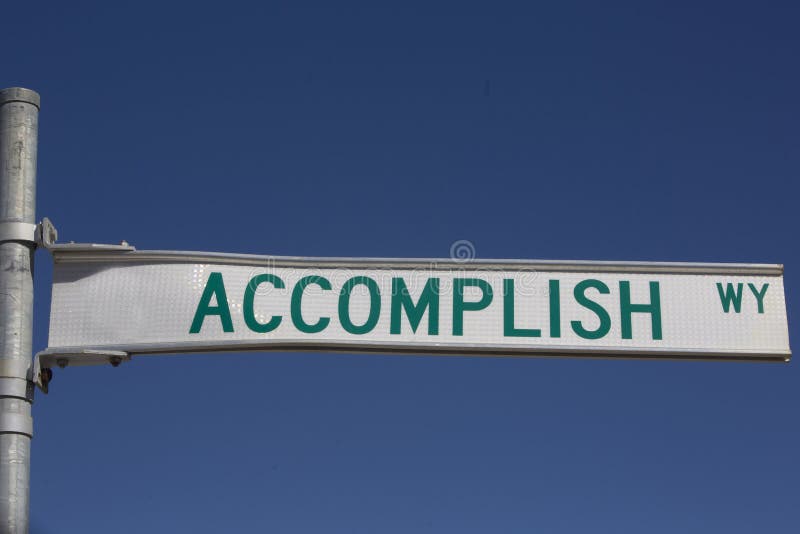 Accomplish Street Sign stock image. Image of excellence - 268239863