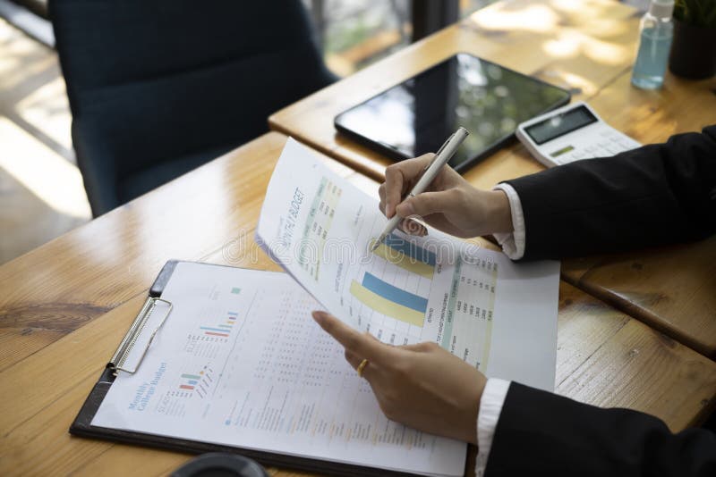 Accountant Analyzing Financial Data on Office Desk. Stock Image - Image ...
