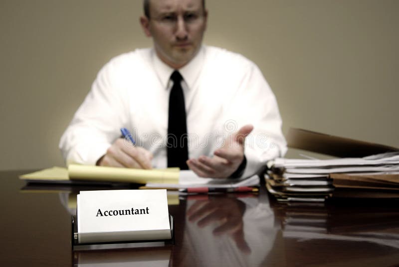 Accountant at Desk stock photo. Image of holding, accountant - 31471194