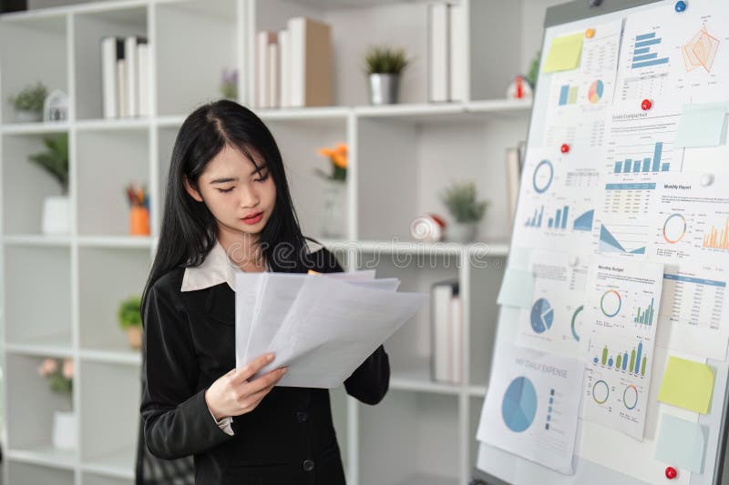 Accountant Engaged in Financial Analysis and Document Preparation in a ...