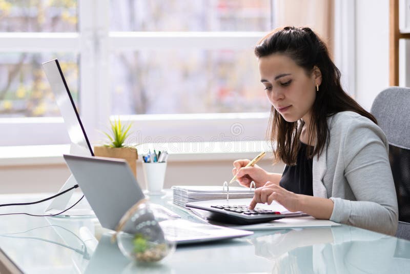 Accountant Lady in Office Using Calculator Stock Photo - Image of bill ...