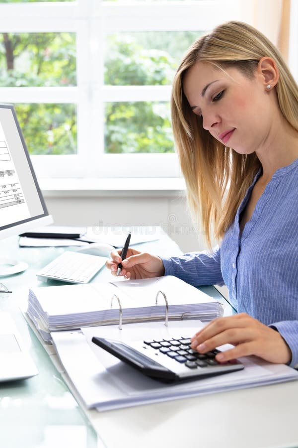 Accountant Lady in Office Using Calculator Stock Photo - Image of fall ...