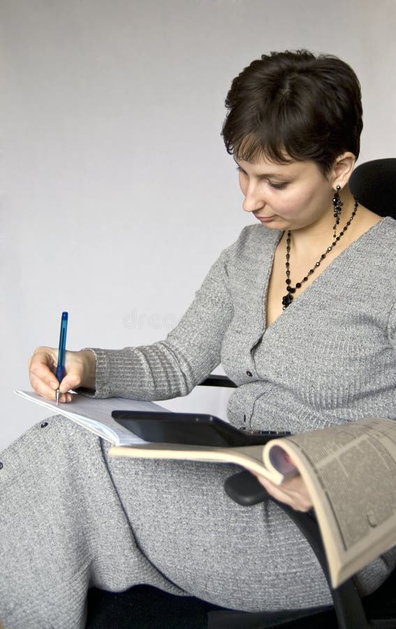 Accountant Makes Notes in a Notebook. Stock Photo - Image of accountant ...