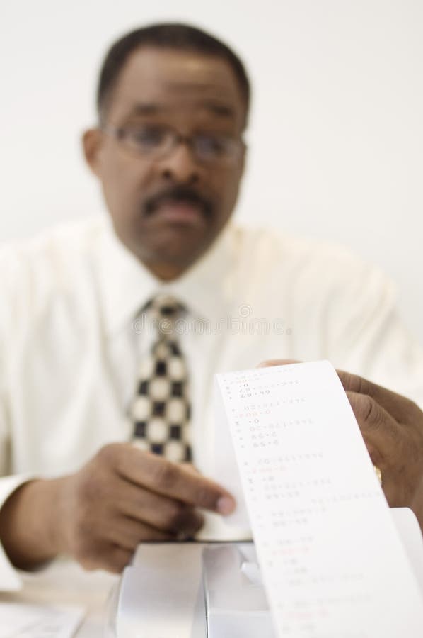 Accountant Reading an Adding Machine Tape Stock Photo - Image of ...