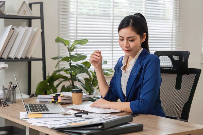 Focused Accountant Analyzing Financial Documents Her Desk Stock Photos ...