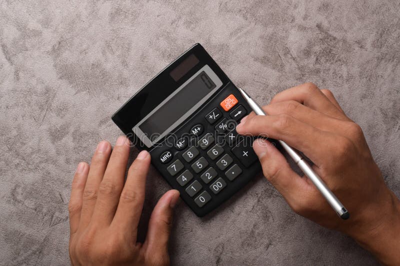 Accountant Using Calculator on Desk Office. Top View Stock Photo ...