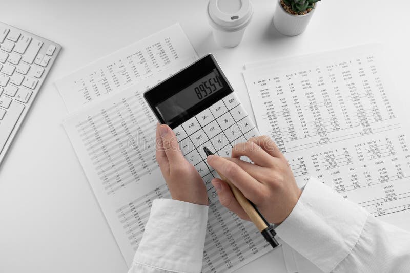 Accountant Using Calculator on Desk Office on White Background with ...
