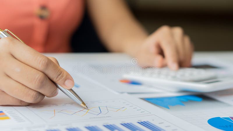 Accountant Using Computer with Clamp and Graph Document, Business Man ...