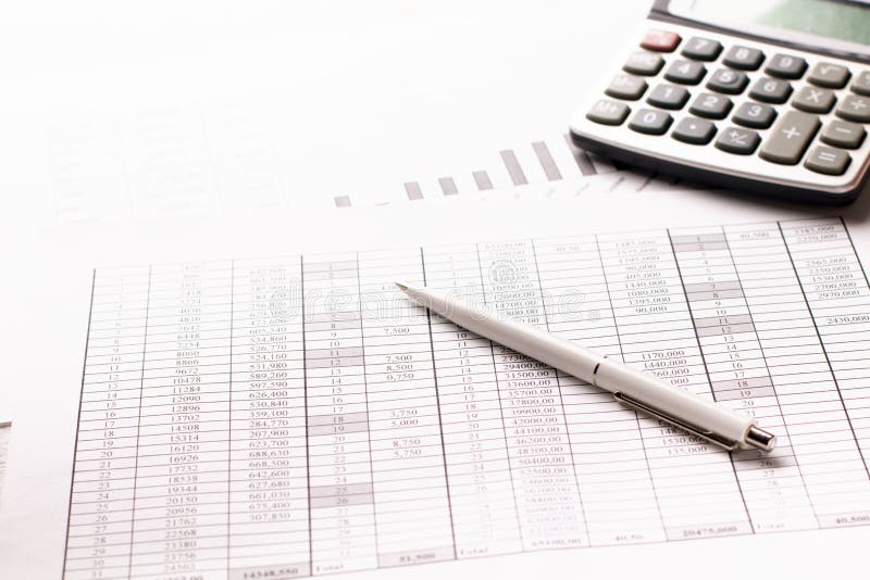 Accountant Work Table with Calculator, Charts and Pen Stock Photo ...