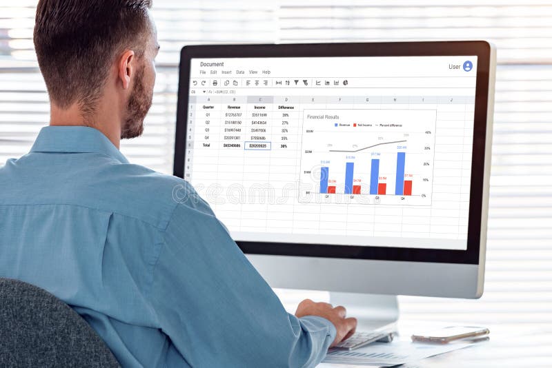 Accountant Working on Financial Report and Charts with Spreadsheet ...