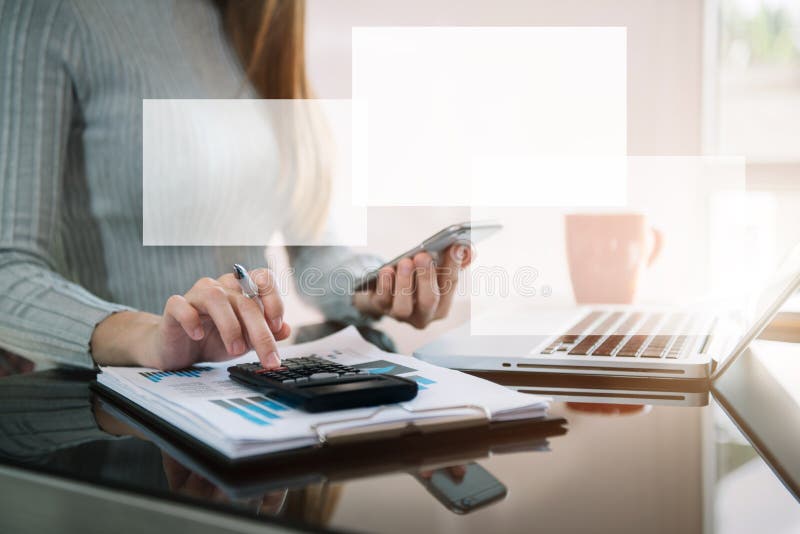 Accountant Working on Laptop Computer with Business Document. Stock ...