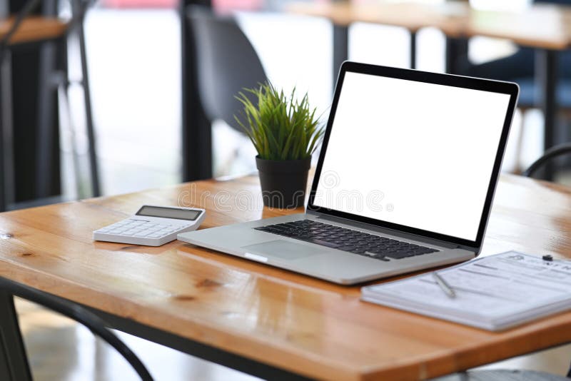 Accountant Workplace with Laptop Computer, Calculator and Documents on ...