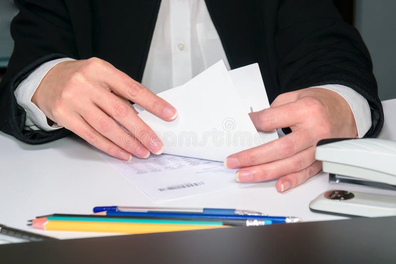 Accountant Works on a Table with Papers. Financial Report Calculations ...
