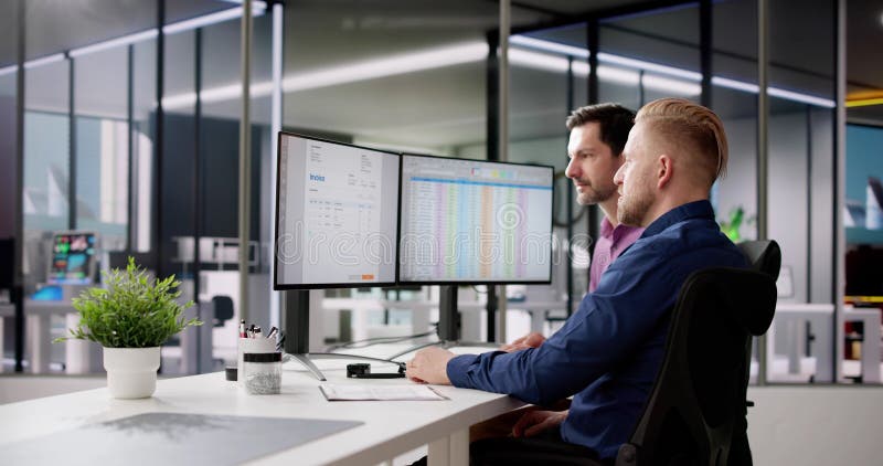 Accountants Looking at Invoice Spreadsheet Stock Image - Image of ...