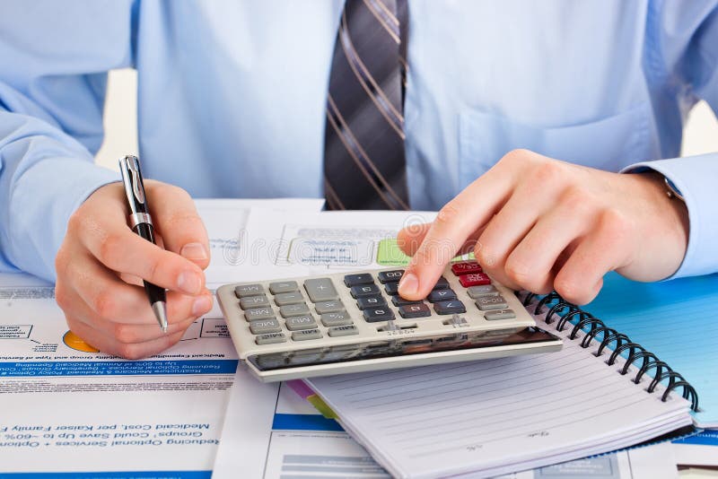 Calculating stock image. Image of hand, math, finance - 9803961