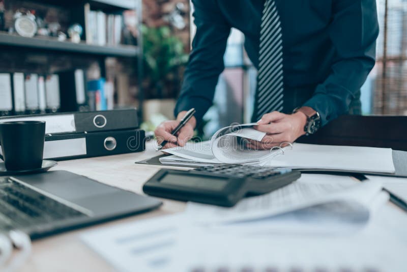 Accounting Reading Report from File Folder and Financial Statement on ...