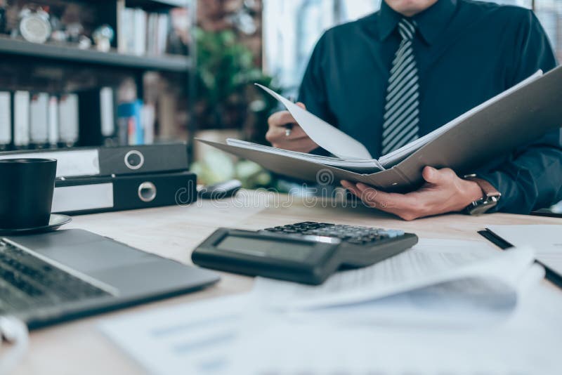 Accounting Reading Report from File Folder and Financial Statement on ...