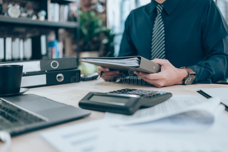 Accounting Reading Report from File Folder and Financial Statement on ...