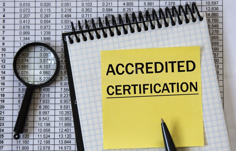 ACCREDITED CERTIFICATION - Words in a White Notebook on the Background ...