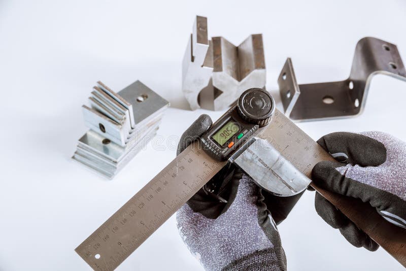 Accurate Measurement of Metal Parts on a White Background with a ...