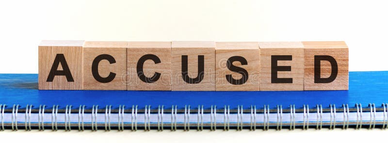 Accused - a Word Made of Wooden Blocks with Black Letters, a Row of ...