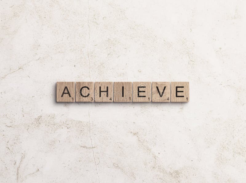 Achieve Word Written on Wooden Cubes Background. Creative Text Concept ...