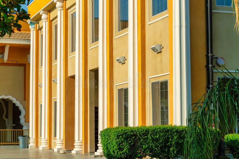 Acient Building Facade with Orange and White Trim Stock Image - Image ...