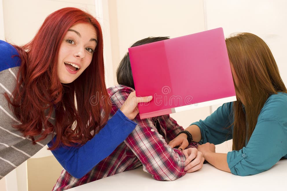 Acomplice stock image. Image of redhead, classroom, college - 24289109