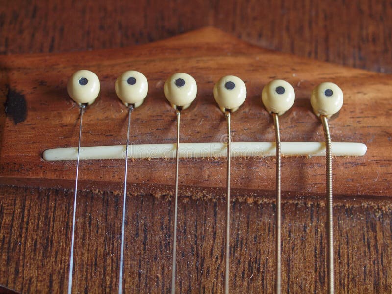 Acoustic guitar closeup stock photo. Image of metal, strings - 42619016