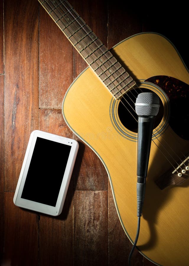 Acoustic Guitar with Microphone and Computer Tablet. Stock Image ...