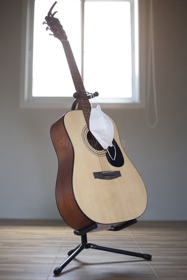 Acoustic Guitar is Placed in the Room by the Window. Stock Image ...