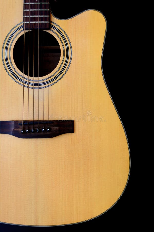 Acoustic Guitar Resting Against a Blank Background Black Stock Image ...