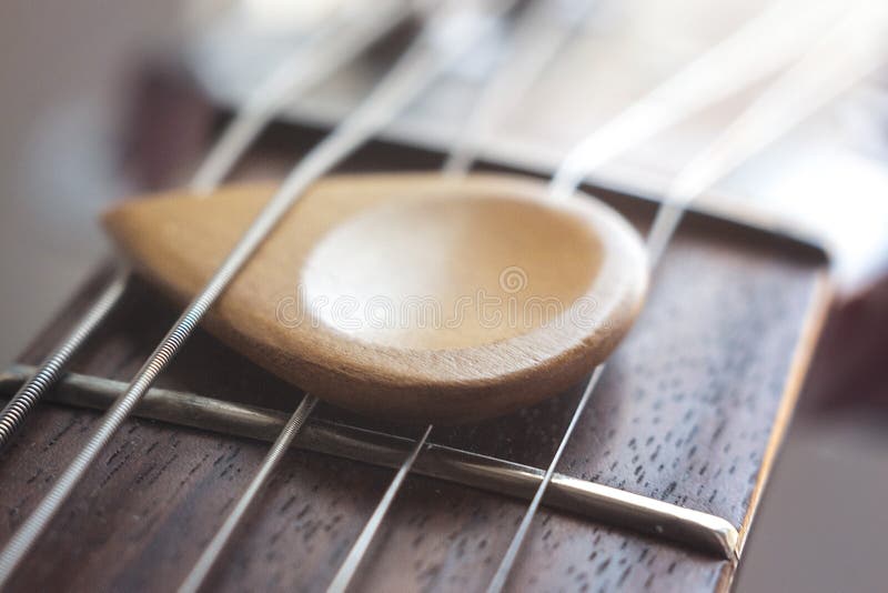Green guitar plectrum stock image. Image of guitars, mediators - 11905267
