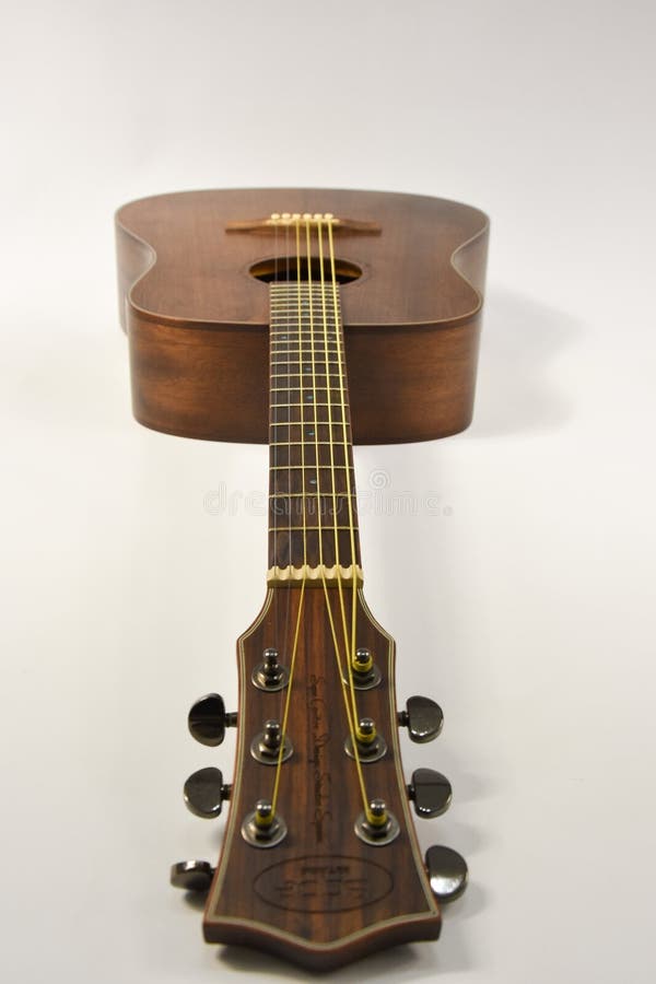 Acoustic Six-string Guitar and Leather Armchair in the Interior Stock ...