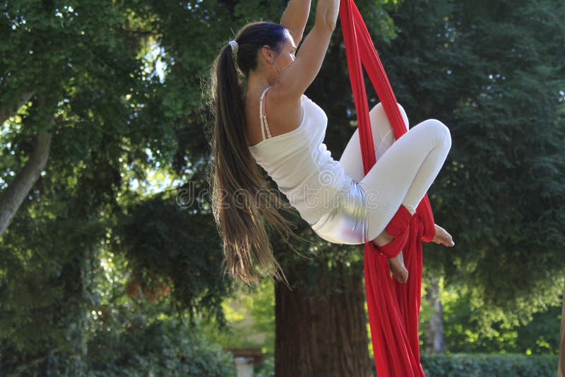 Acrobat Doing Moves in a Park Stock Image - Image of park, pose: 217140163