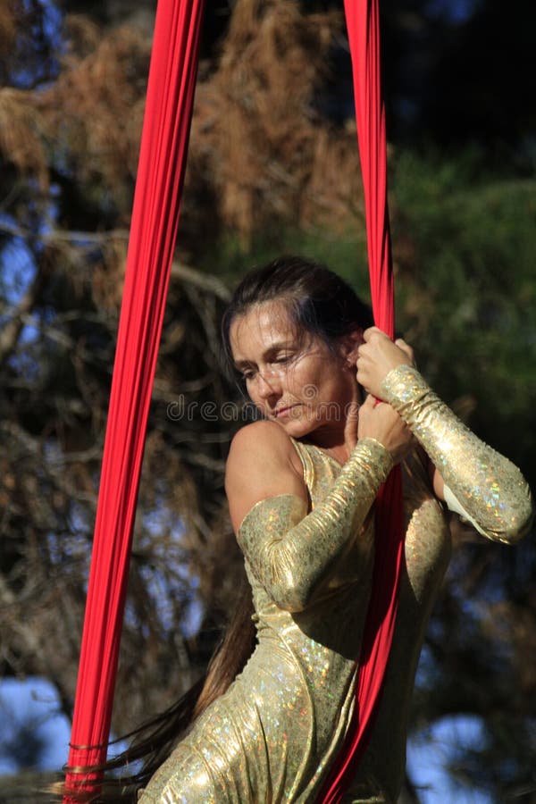 Acrobat Doing Moves in a Park Stock Photo - Image of park, ropes: 217140096
