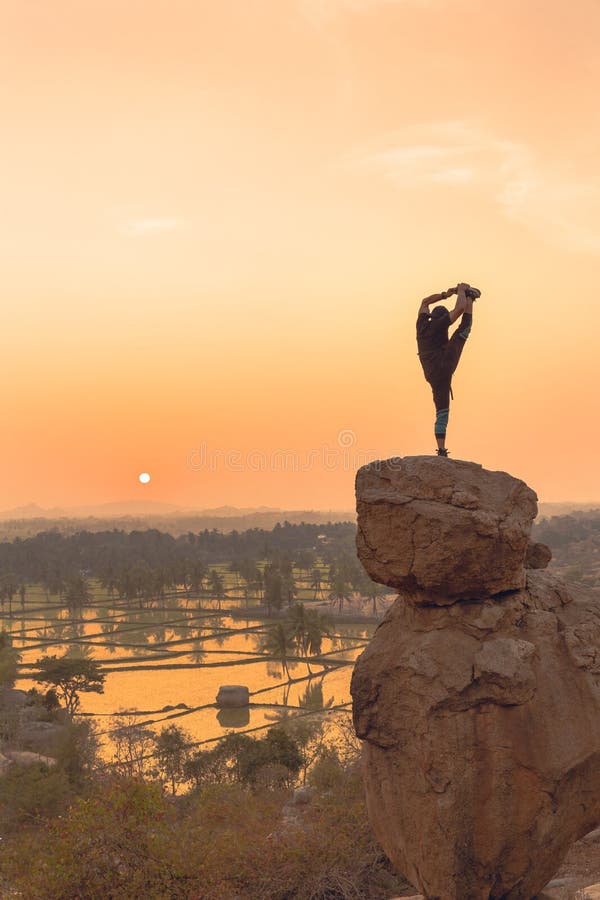 An Acrobat Performs Acrobatics at the Spectacular Sunset Point at Hampi ...