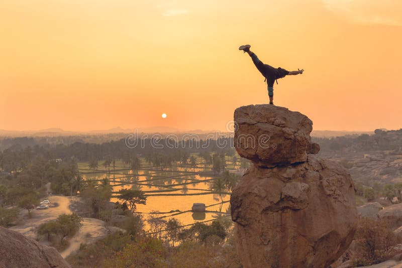 An Acrobat Performs Acrobatics at the Spectacular Sunset Point at Hampi ...