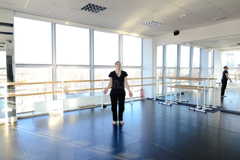 Acrobat in Sportswear Preparing for Performance in Hall. Stock Photo ...